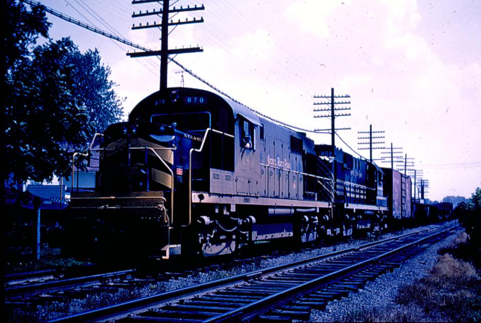 NKP RS36 870 NKP District westbound with train | The Nickel Plate Archive