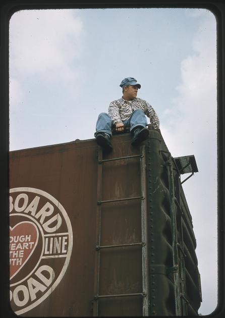 Worker riding on top of SAL boxcar | The Nickel Plate Archive