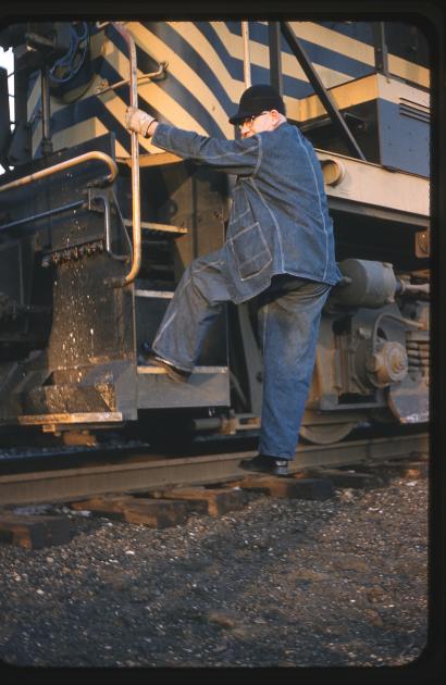 Worker stepping onto RS-11 in March 1960 | The Nickel Plate Archive